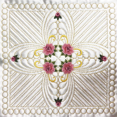 Trapunto Feather Rose Quilt | OregonPatchWorks